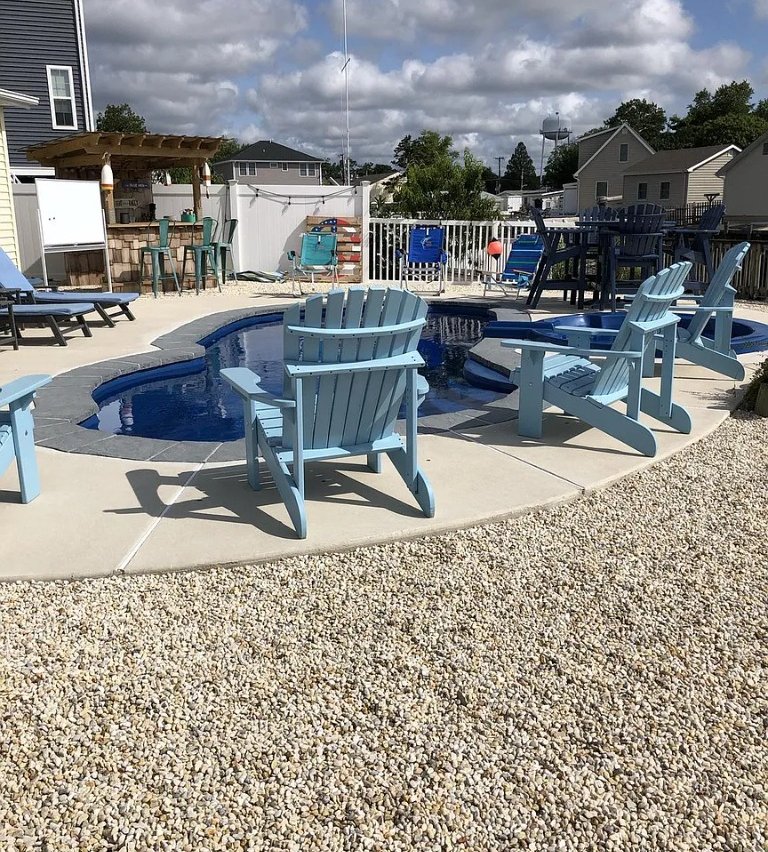 Waterfront with heated pool, hot tub, and fire-pit!